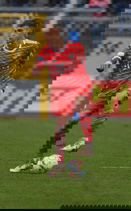 Justin Janitzek takes photos at the soccer regional league Bavaria ...