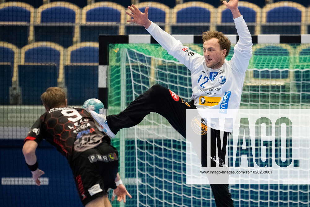 221213 HK Malmös Adam Tumba and IFK Kristianstads goalkeeper Gustaf ...
