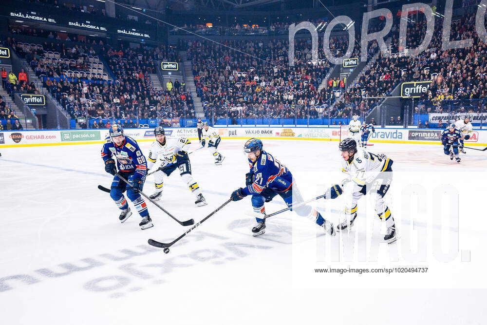 221217 Växjös Erik Josefsson, Brian Cooper and HV71s Herman Hansson during the ice hockey match in