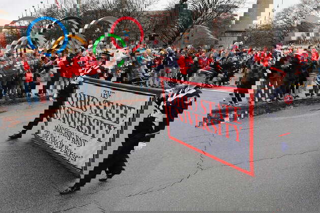 The Ohio State Marching Band marches during the Peach Bowl Parade prior ...