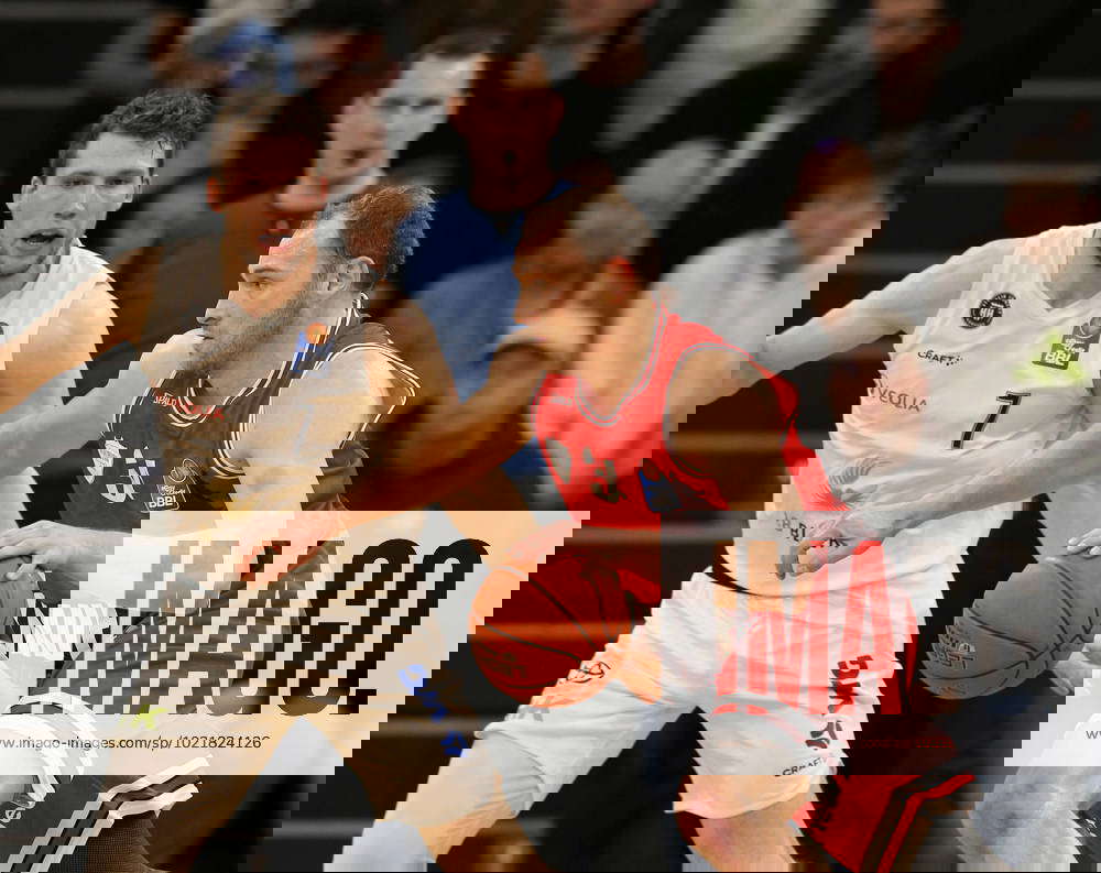 on the ball Felix Hoffmann against Lukas Meisner Towers , left ...