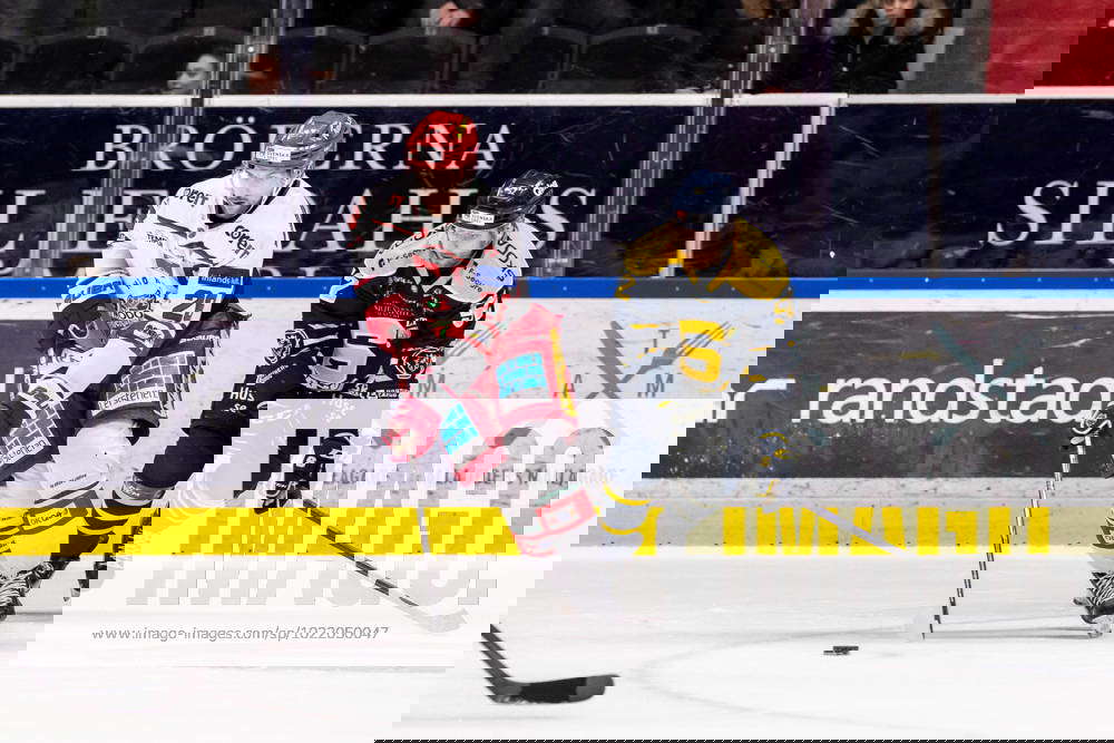 230111 Modos Emil Wahlberg and Södertäljes Christopher Liljewall during the ice hockey match in