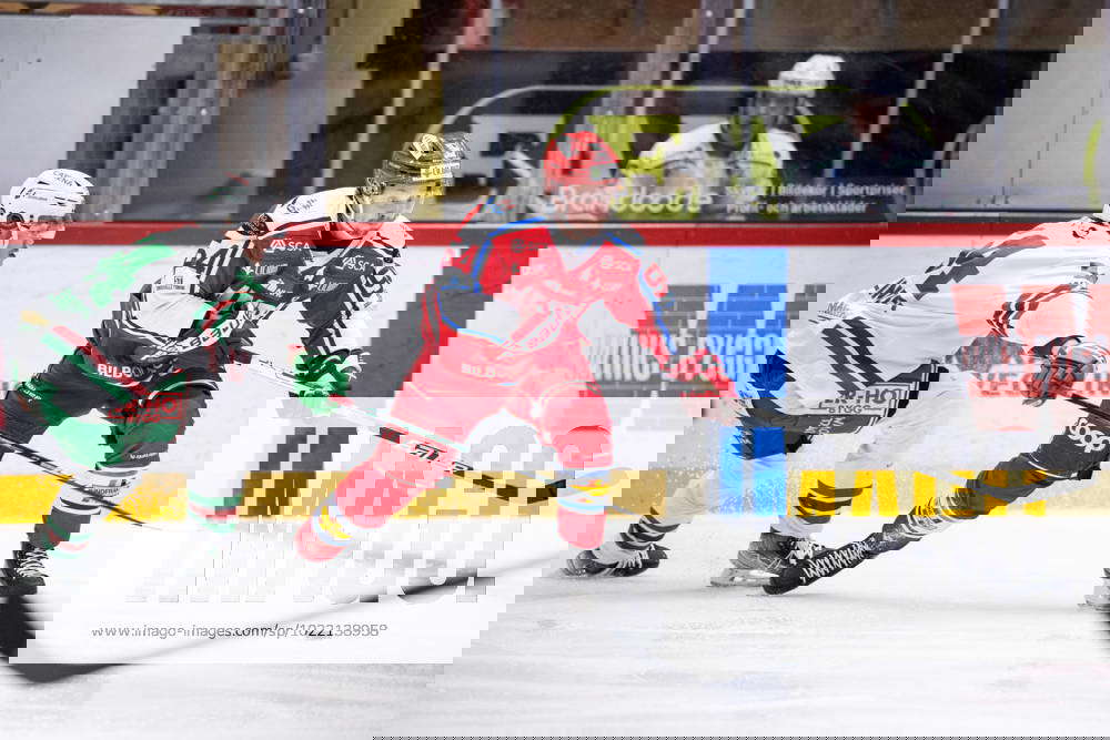 Rögles William Wallinder and Timras Jonathan DahlÃ n during the ice ...