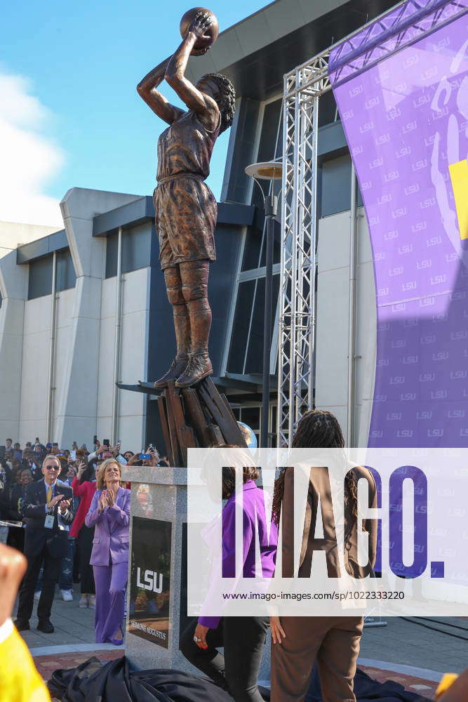 January 15, 2023: Seimone Augustus looks up at her new statue with LSU ...