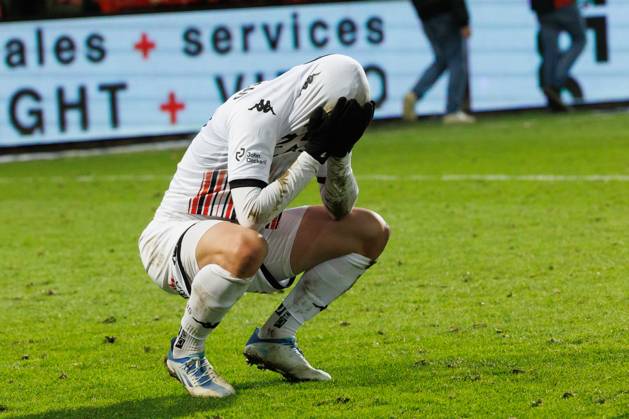 Seraing s Vagner Mvoue looks dejected after losing a soccer match ...