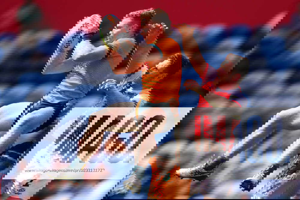 RUGBY SYDNEY SEVENS, Henry Hutchison of Australia goes high for the ...