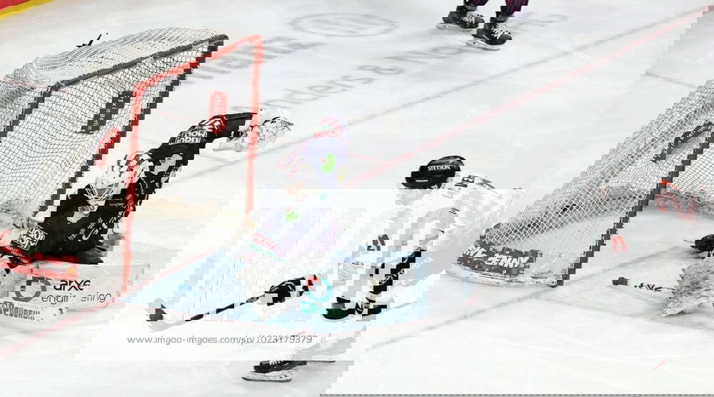 Mark Olver scores the goal to equalize 3 3 against goalie Juho ...