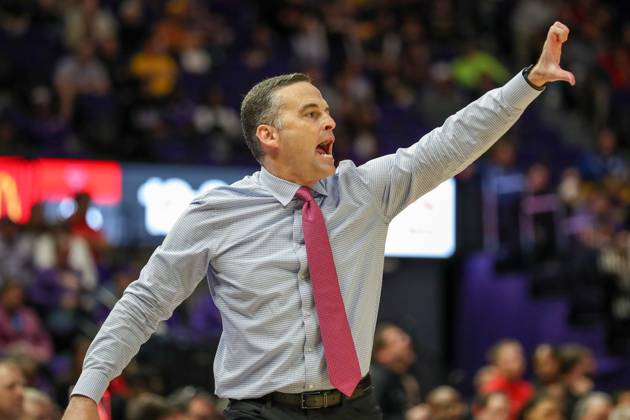 : LSU Head Coach Matt MacMahon signals a play during NCAA, College ...