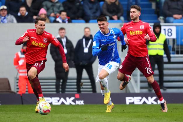 Mathias Honsak Darmstadt in a running duel with Konrad Faber Regensburg ...