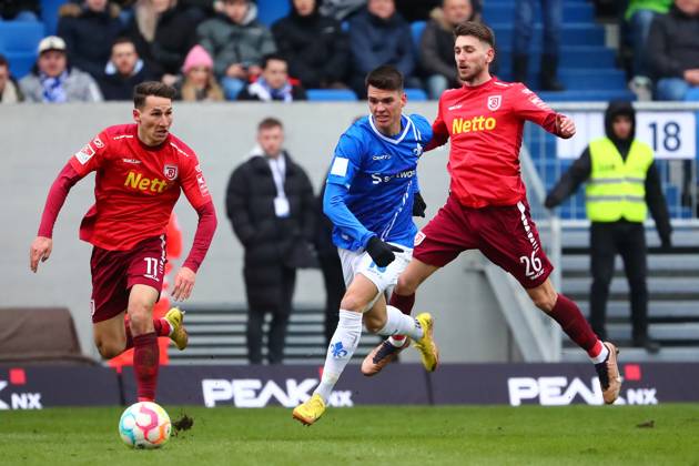 Mathias Honsak Darmstadt in a running duel with Konrad Faber Regensburg ...