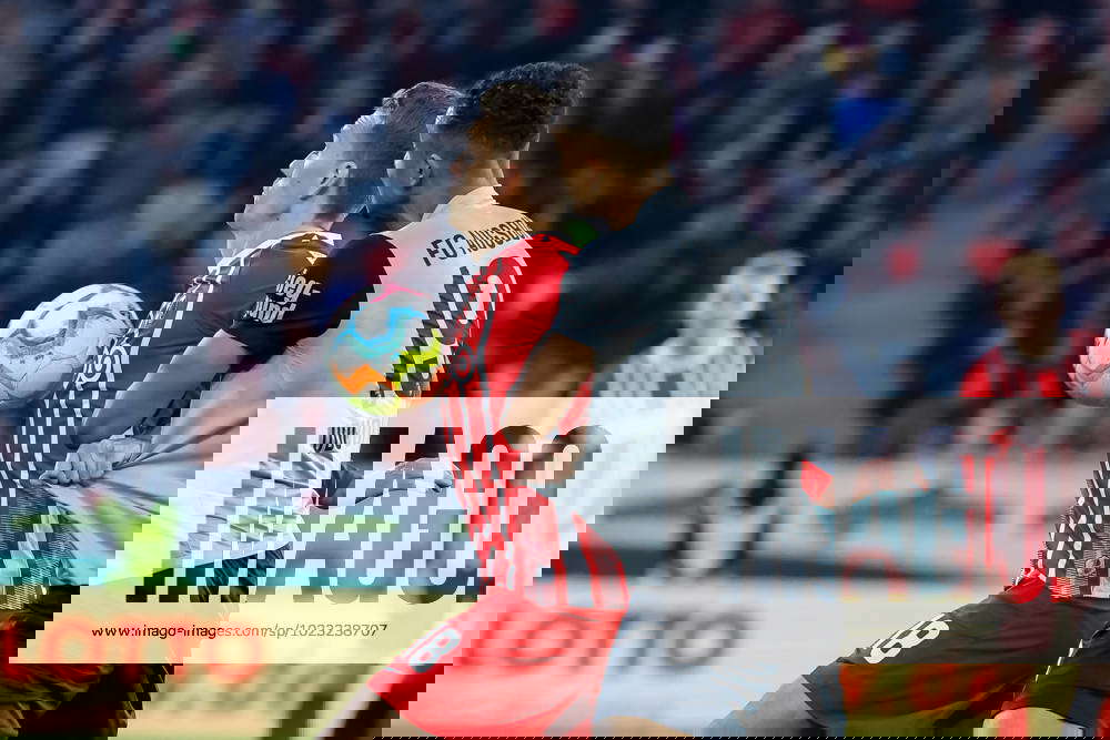 Nils Petersen SC Freiburg, 18 and Felix Uduokhai FC Augsburg 19 in duel ...