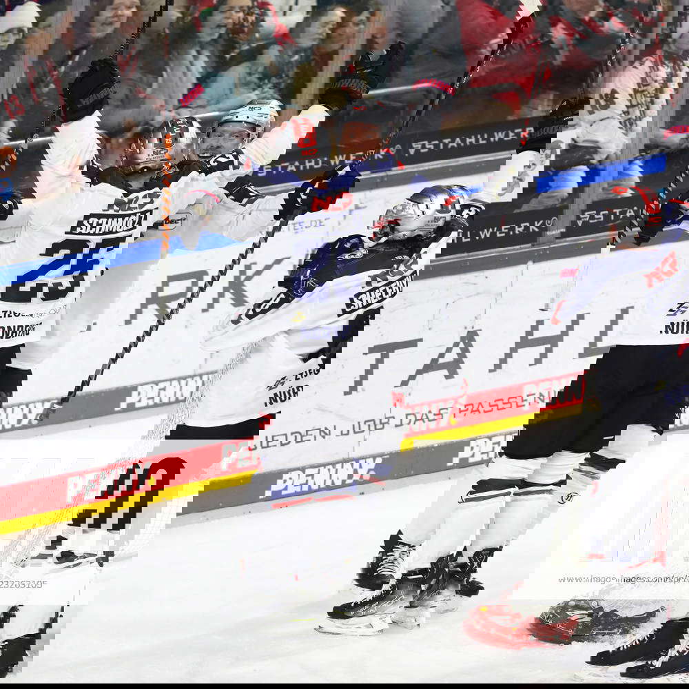 Daniel Schmoelz Nuernberg, Nr 25 and Ryan Stoa Nuernberg celebrate the ...