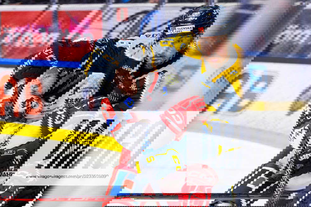 230201 Västerviks Viktor Larsson and Södertäljes Linus Videll during ice hockey match in