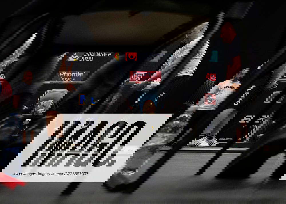 230202 An athlete competes in the ladies Powerlifting Bench Press ...