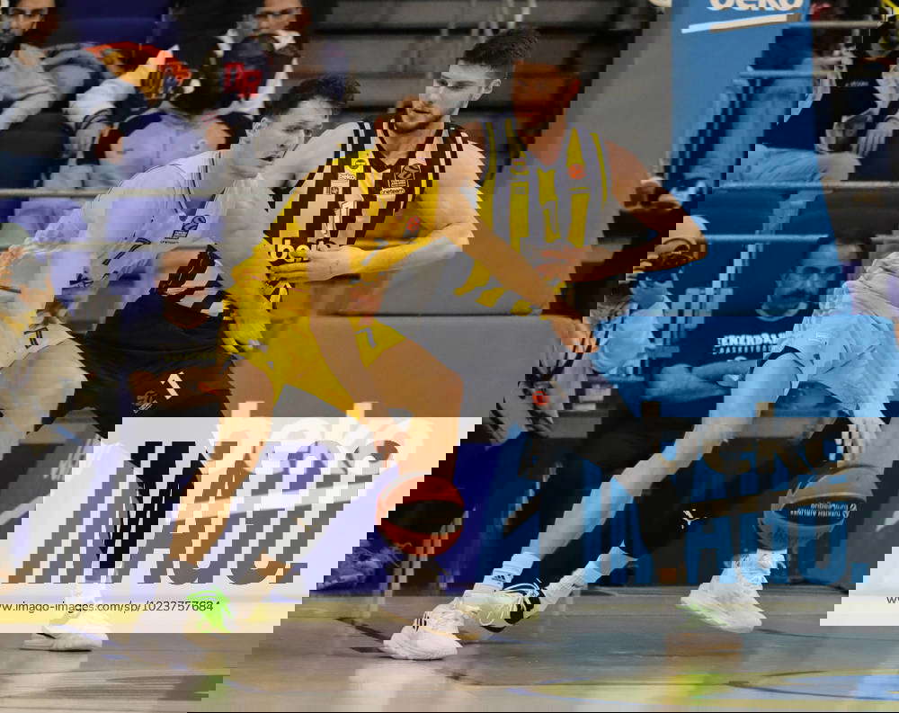 Metecan Birsen 1 of Fenerbahce Beko and Yanni Wetzell 7 of Alba Berlin ...