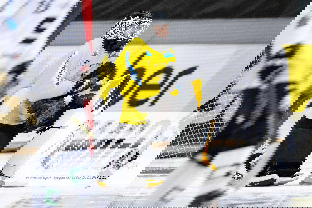 230207 Sandvikens goalkeeper Joel Othen depresses during the bandy ...