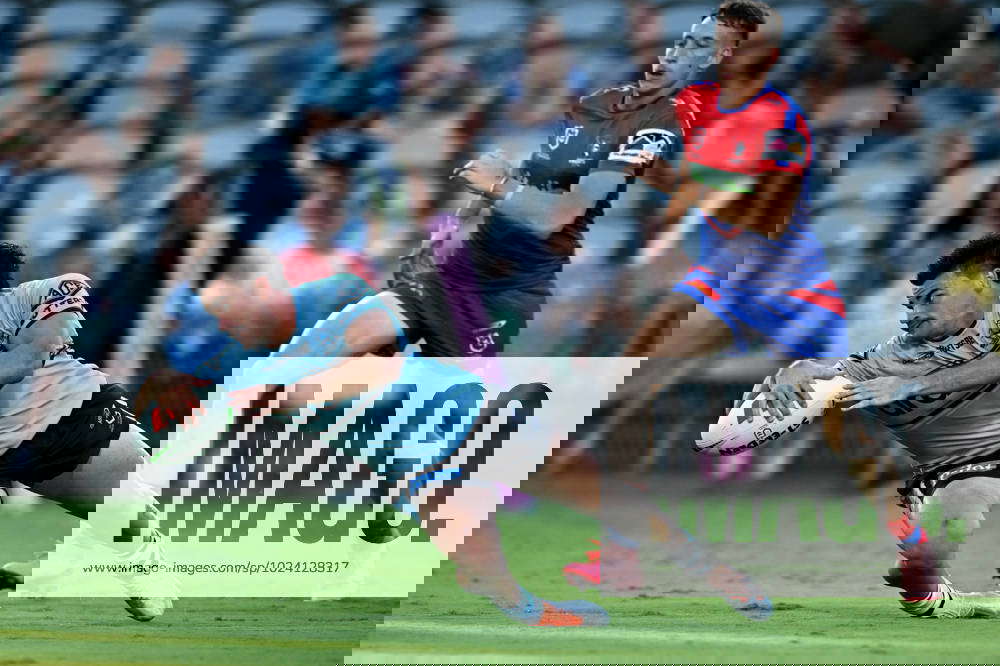 NRL CHALLENGE KNIGHTS SHARKS, Daniel Atkinson of the Sharks scores a ...