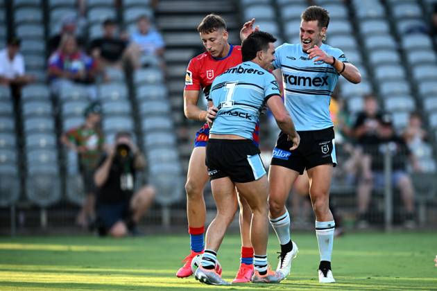 NRL CHALLENGE KNIGHTS SHARKS, Daniel Atkinson of the Sharks scores a ...