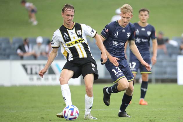 ALEAGUE MACARTHUR PHOENIX, Jake Holman of the Bulls gains possession ...