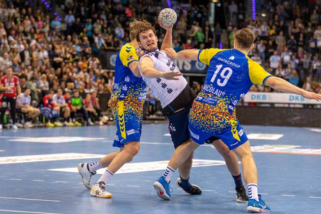 Magnus Roed SG Flensburg Handewitt 77 is fouled by Ole Schelker HSG ...