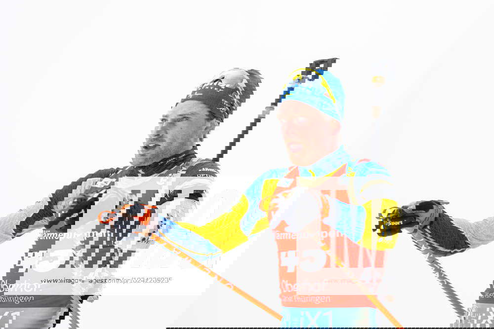 230212 Jesper Nelin of Sweden competes in mens pursuit during the IBU ...