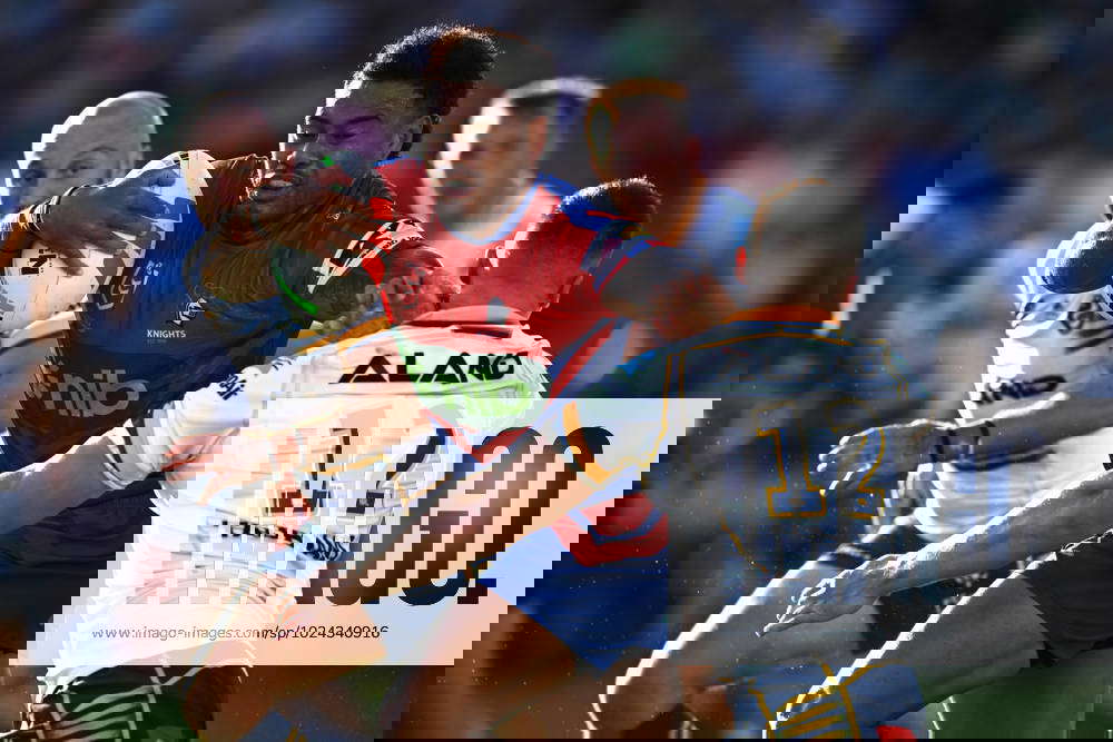 NRL CHALLENGE KNIGHTS EELS, Greg Marzhew of the Knights fends off Matt ...