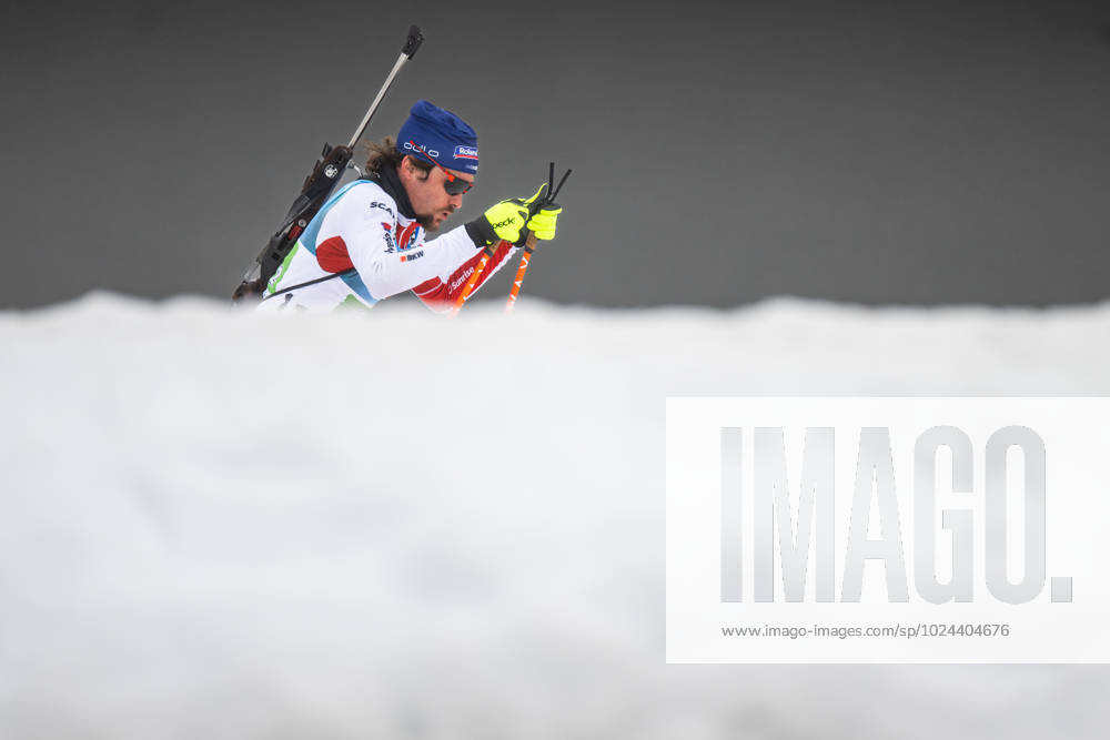 230218 Jeremy Finello of Switzerland competes in Men s 4x7.5 km Relay ...