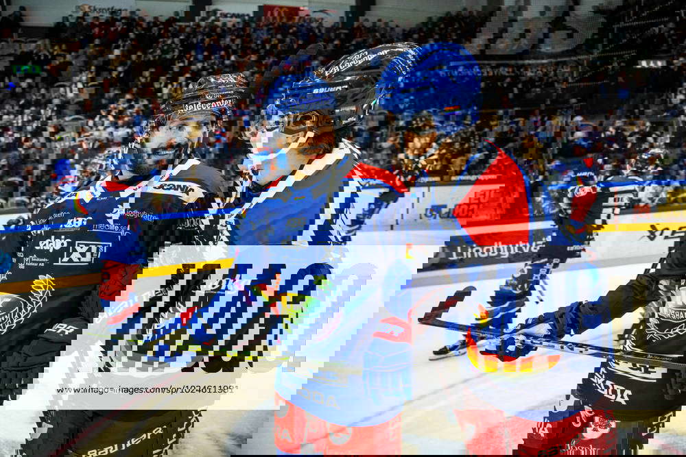 Oskarshamns Cameron Brace and Hugo Jonasson celebrate after the ice hockey match in the SHL between