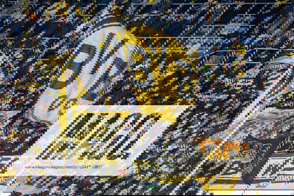 The traveling Ultras of Borussia Dortmund BVB 09 in the guest block ...