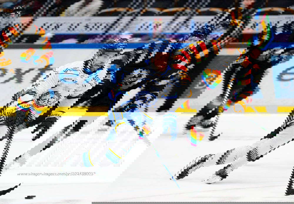 230225 Leksands Oskar Lang and Skellefteas Petter Granberg during the SHL ice hockey match between