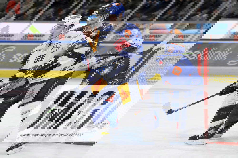 Dario Simion, EVZ, hi Dean Kukan, ZSC, goalkeeper Simon Hrubec, ZSC ...