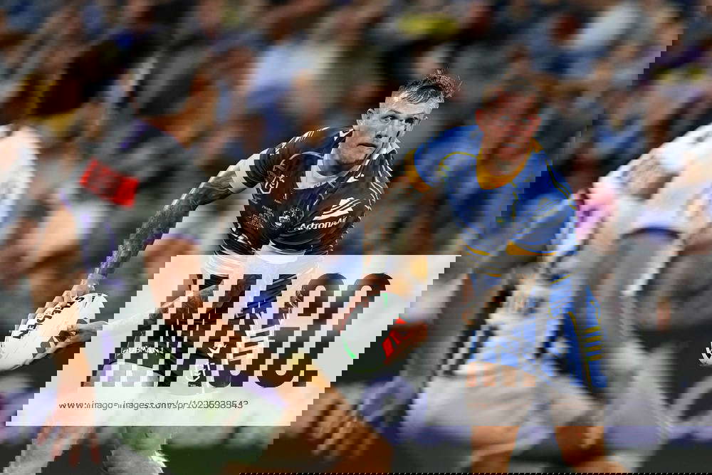 NRL EELS STORM, J?maine Hopgood of the Eels offloads the ball during ...