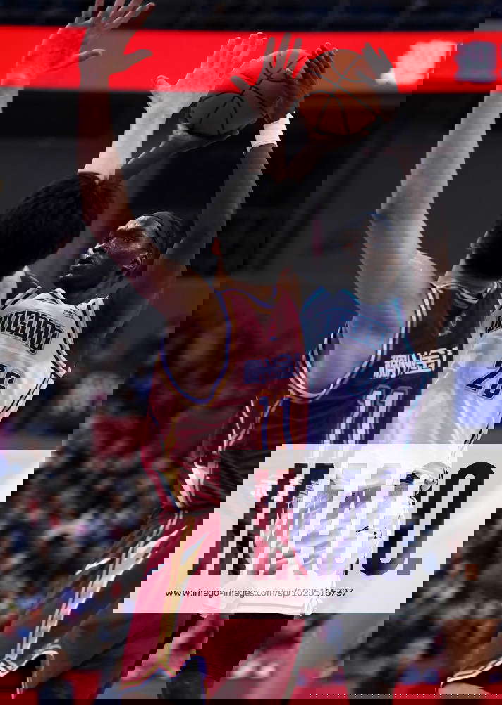 (230303) -- QINGDAO, March 3, 2023 -- Duop Reath (R) of Qingdao Eagles ...