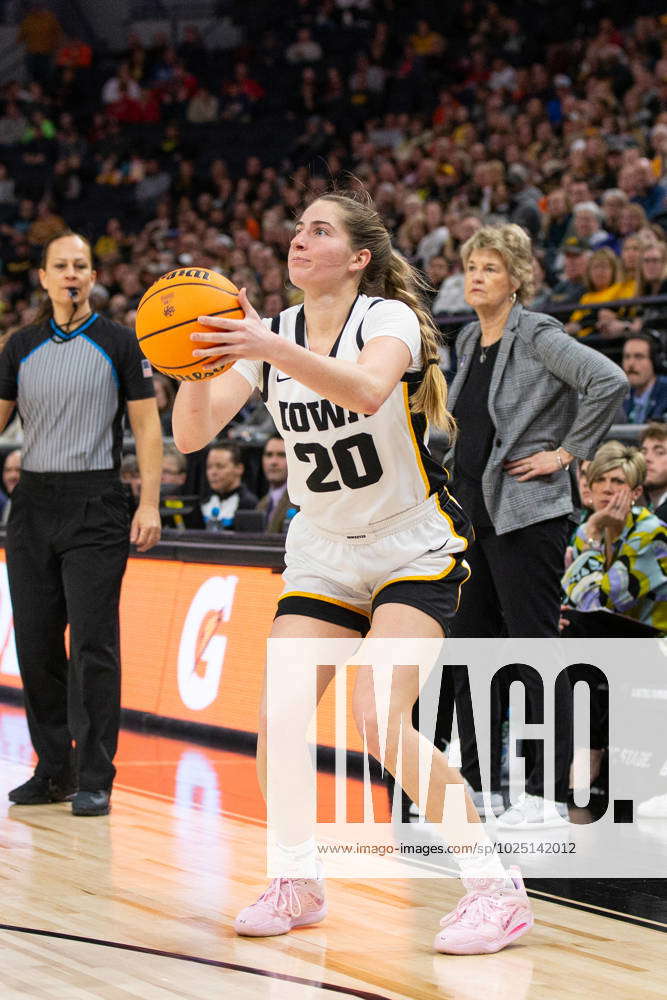 MINNEAPOLIS, MN - MARCH 03: Iowa Hawkeyes guard Kate Martin attempts a ...