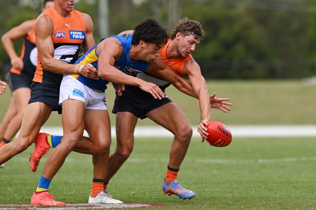 AFL GIANTS SUNS, Harry Perryman of the Giants and Alex Davies of the ...