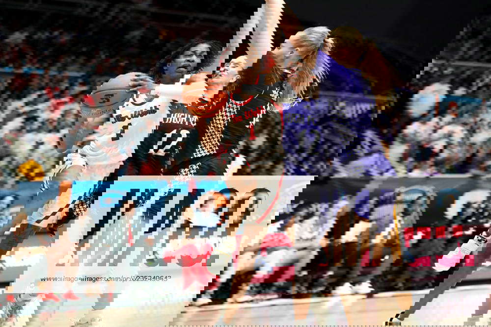 CHARLOTTE, NC - MARCH 05: Jenson Edwards (12) and Anna Hager (14) of ...