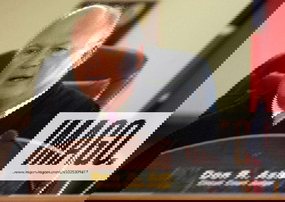 News: Judge Don R. Ash addresses the court during the sentencing of ...