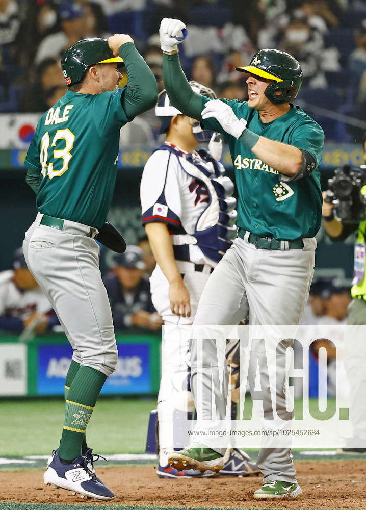 World Baseball Classic Robbie Perkins (R) of Australia celebrates with ...