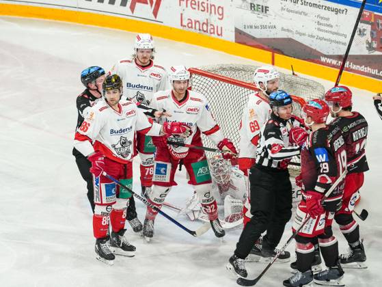 Eisbaeren players protect their goalie Devin Williams Eisbaeren ...