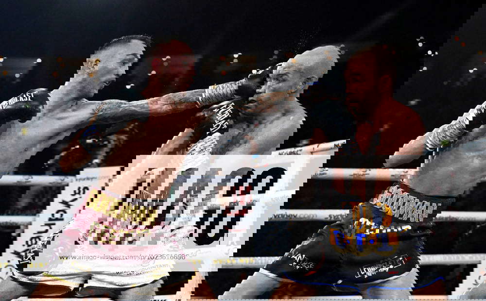 BOXING TSZYU HARRISON, Sam Goodman strikes T J Doheny during their WBO ...