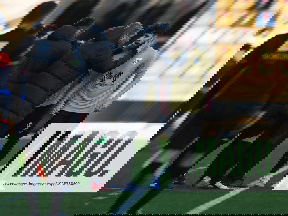 Liviu Ciobotariu talks with Mihai Cosmin Radut in the football match ...