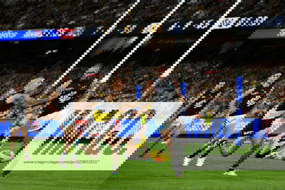 AFL TIGERS BLUES, Jacob Weitering of Carlton clears the ball during the ...