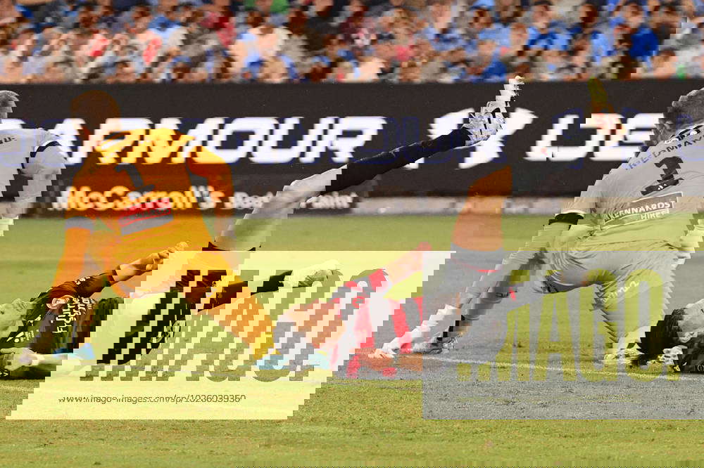 ALEAGUE SYDNEY WANDERERS, Amour Layouni of the Wanderers rolls over as ...