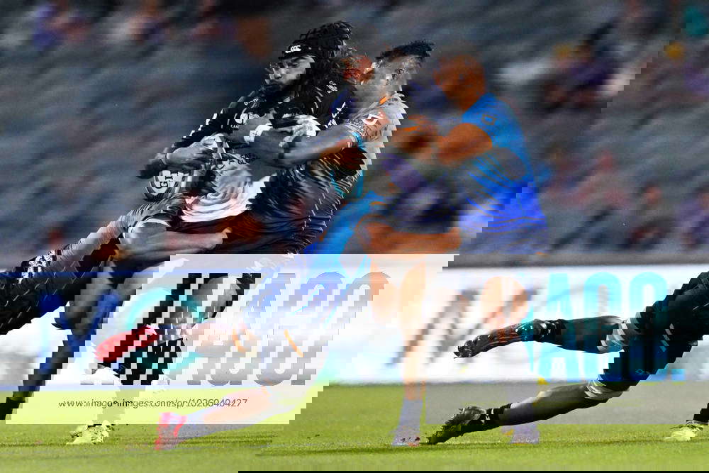 SUPER RUGBY BRUMBIES PASIFIKA, Andy Muirhead of the Brumbies is tackled ...