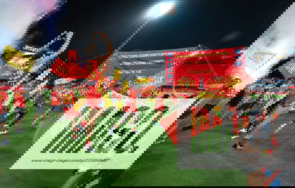 AFL SUNS SWANS, Suns players are seen running onto the field for the ...