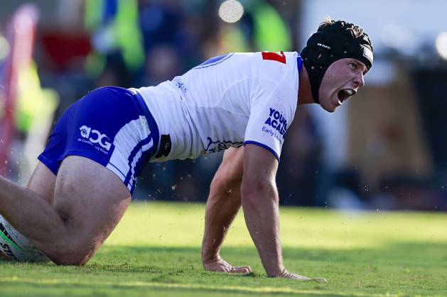NRL BULLDOGS TIGERS, Matt Burton scores a try try during the NRL Round ...
