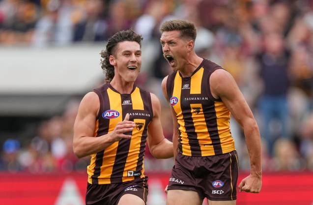 AFL HAWKS BOMBERS, Fergus Greene of the Hawks celebrates after kicking ...