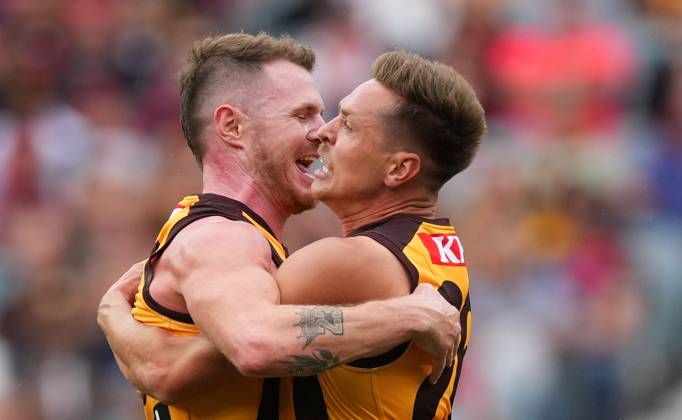 AFL HAWKS BOMBERS, Fergus Greene of the Hawks celebrates after kicking ...