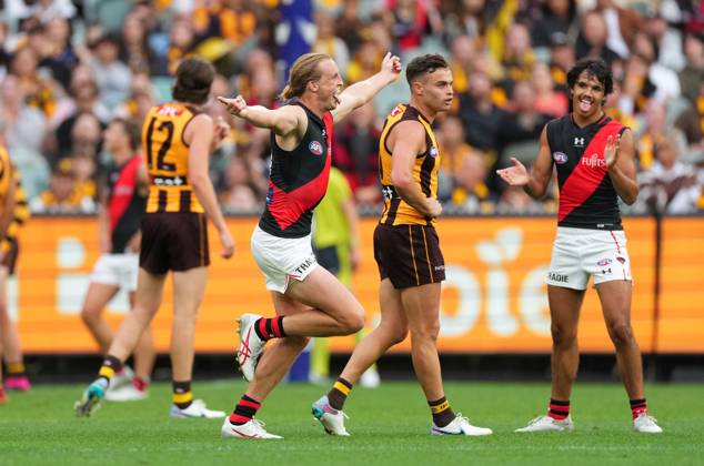 AFL HAWKS BOMBERS, Mason Redman of the Bombers celebrates after kicking ...