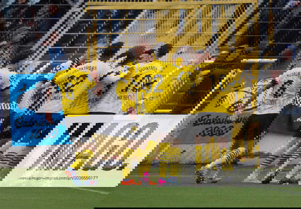 Dortmund players celebrate with Ole Pohlmann BV Borussia Dortmund U23 ...